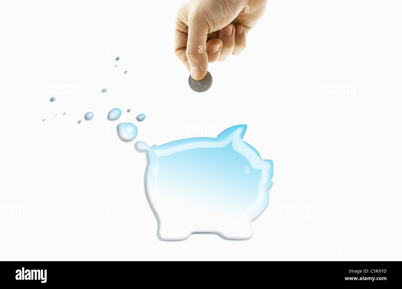 finger put coin into piggy bank Stock Photo - Alamy