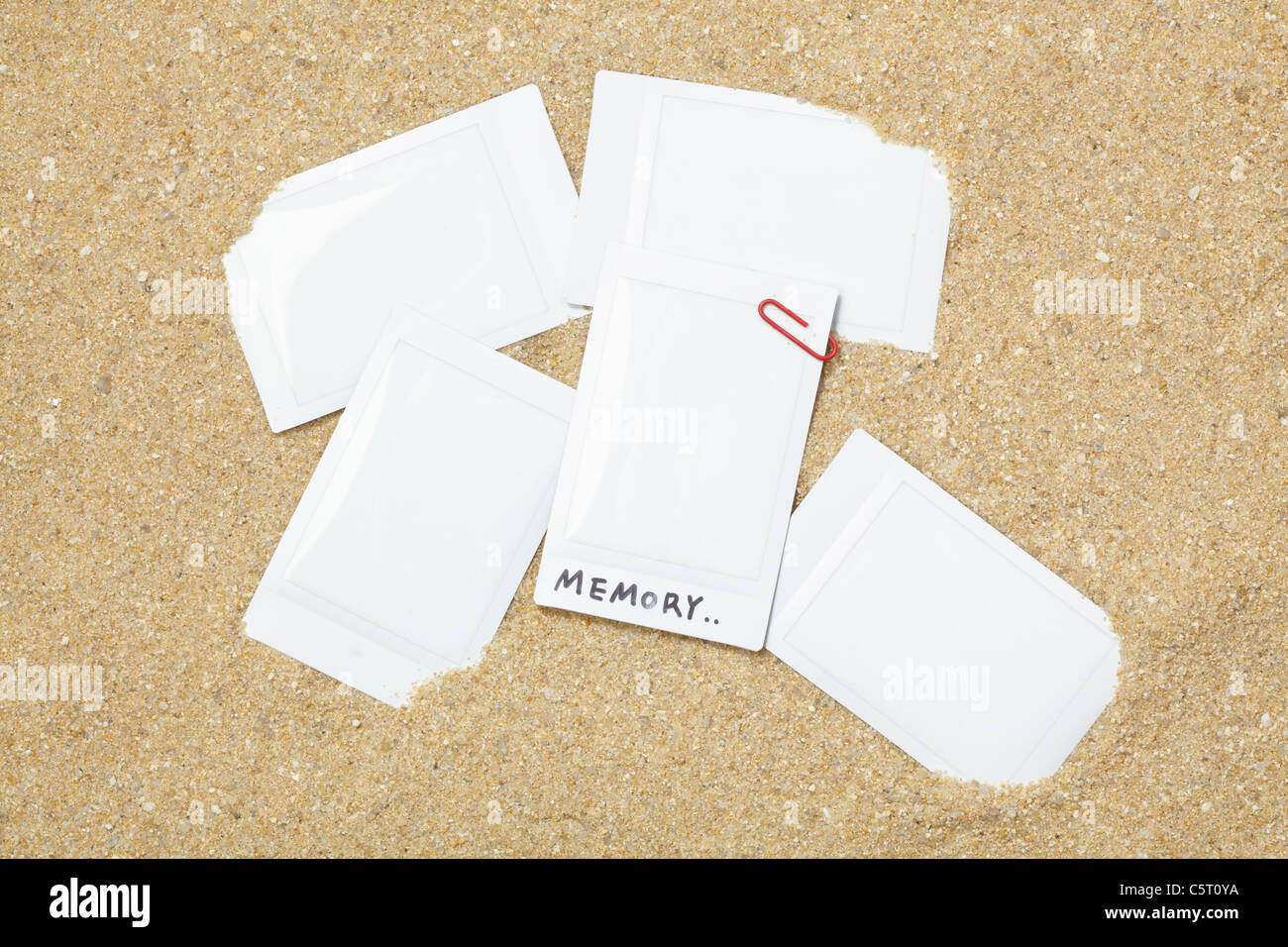 papers in the sand Stock Photo - Alamy