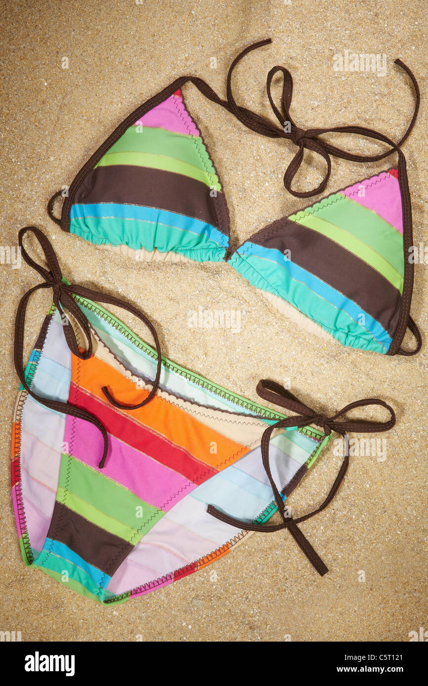 bikini on the sand Stock Photo - Alamy