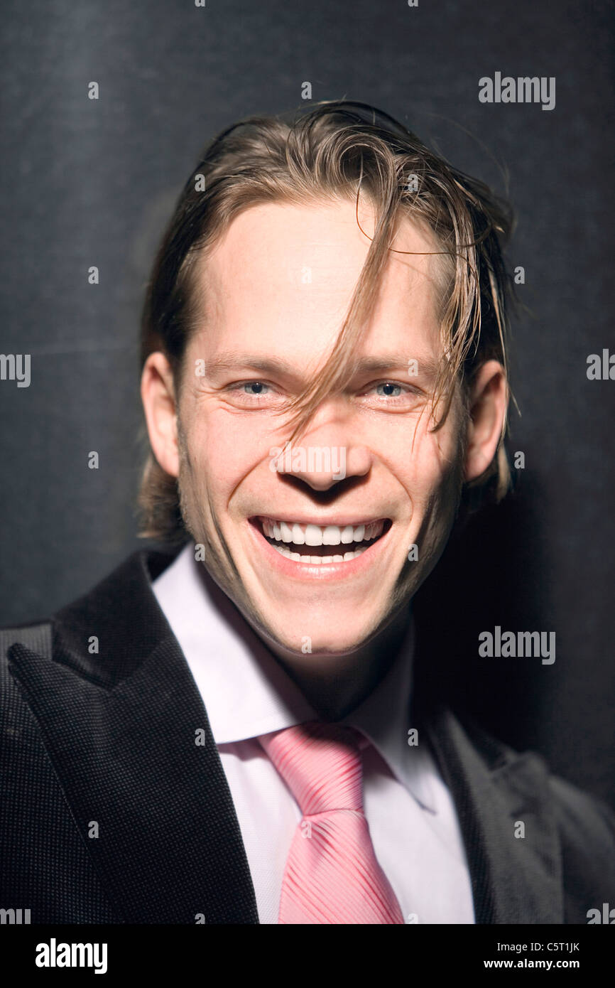 Young businessman, laughing, portrait Stock Photo - Alamy