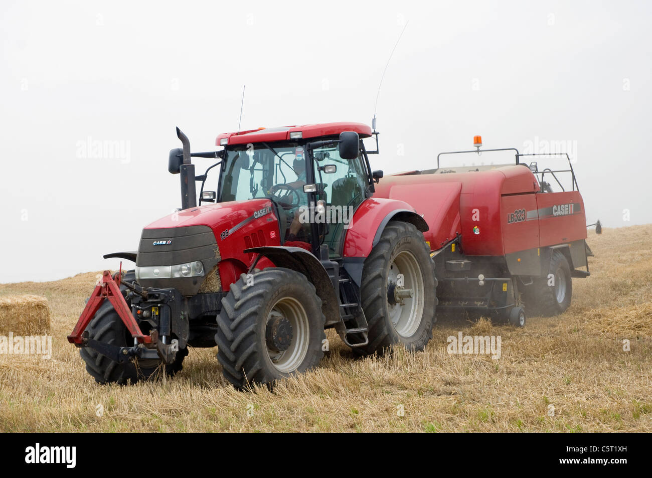 Tractor baler baling farming arable hi-res stock photography and images ...