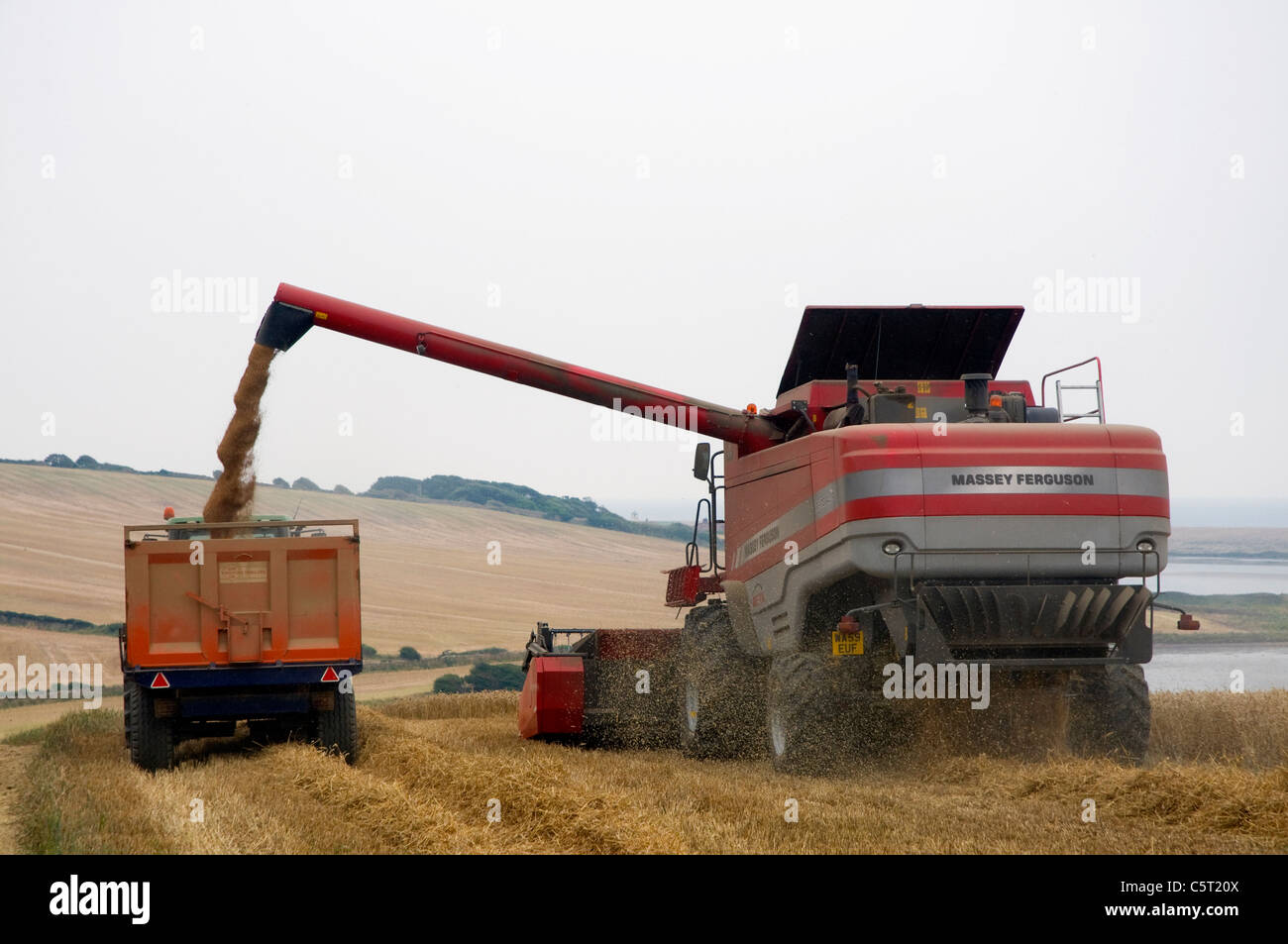 Red combine harvester hi-res stock photography and images - Alamy