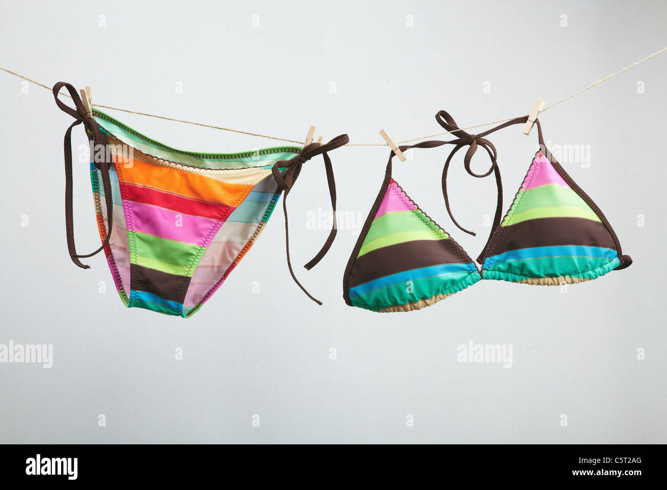 bikini hanging washing line Stock Photo - Alamy