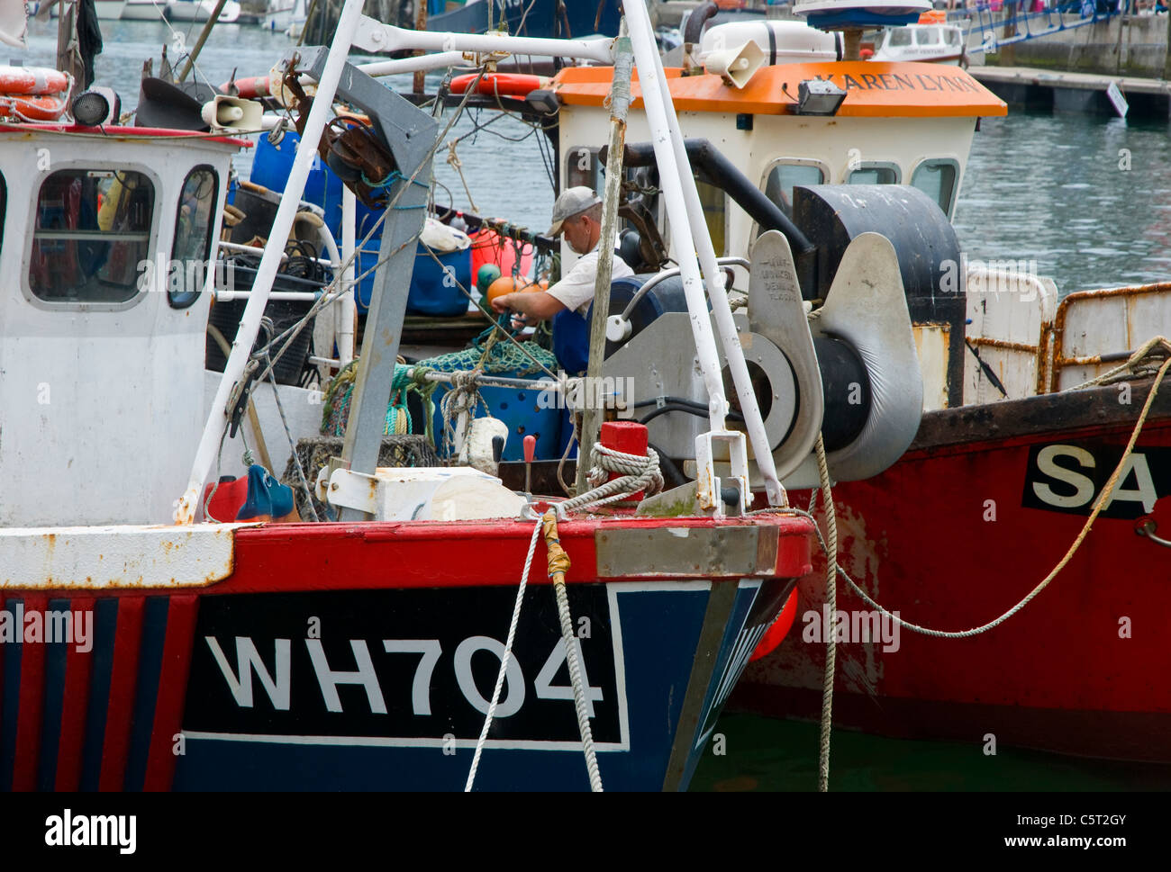 Mending fishing nets hi-res stock photography and images - Alamy