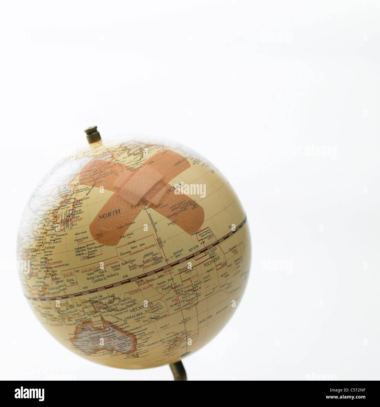 Earth globe band aid hi-res stock photography and images - Alamy