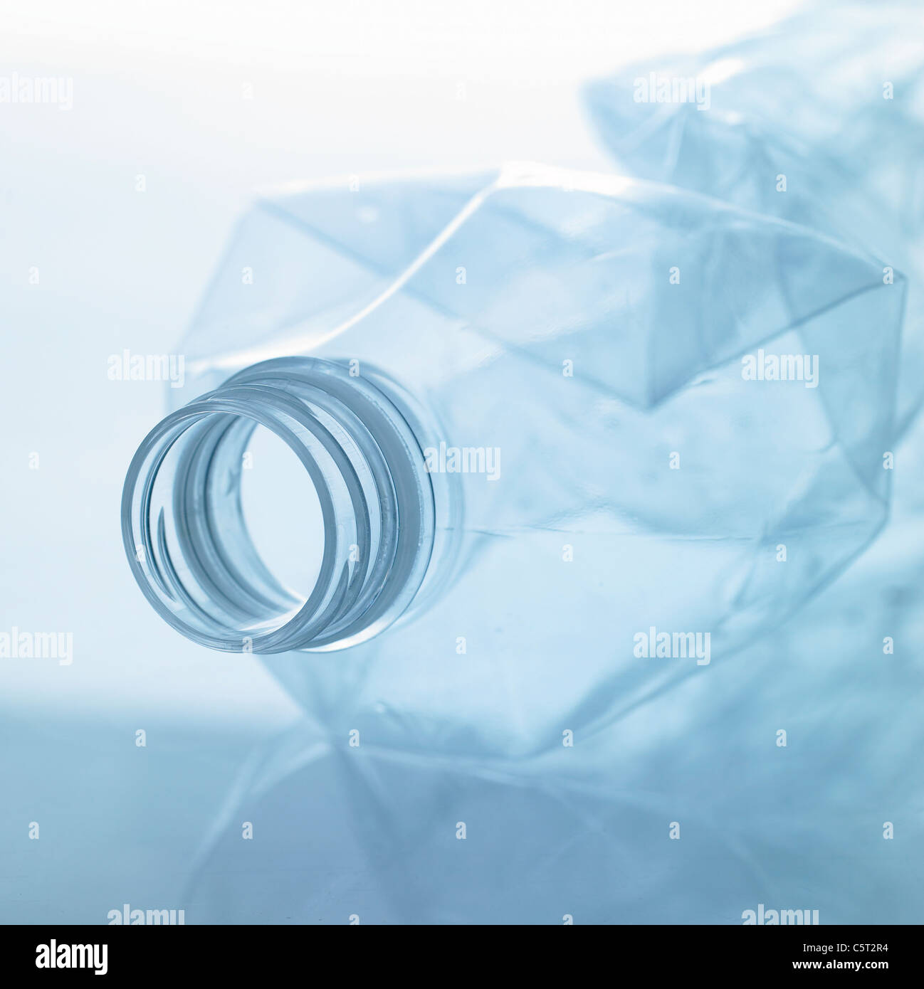 Crumpled plastic bottle Stock Photo - Alamy