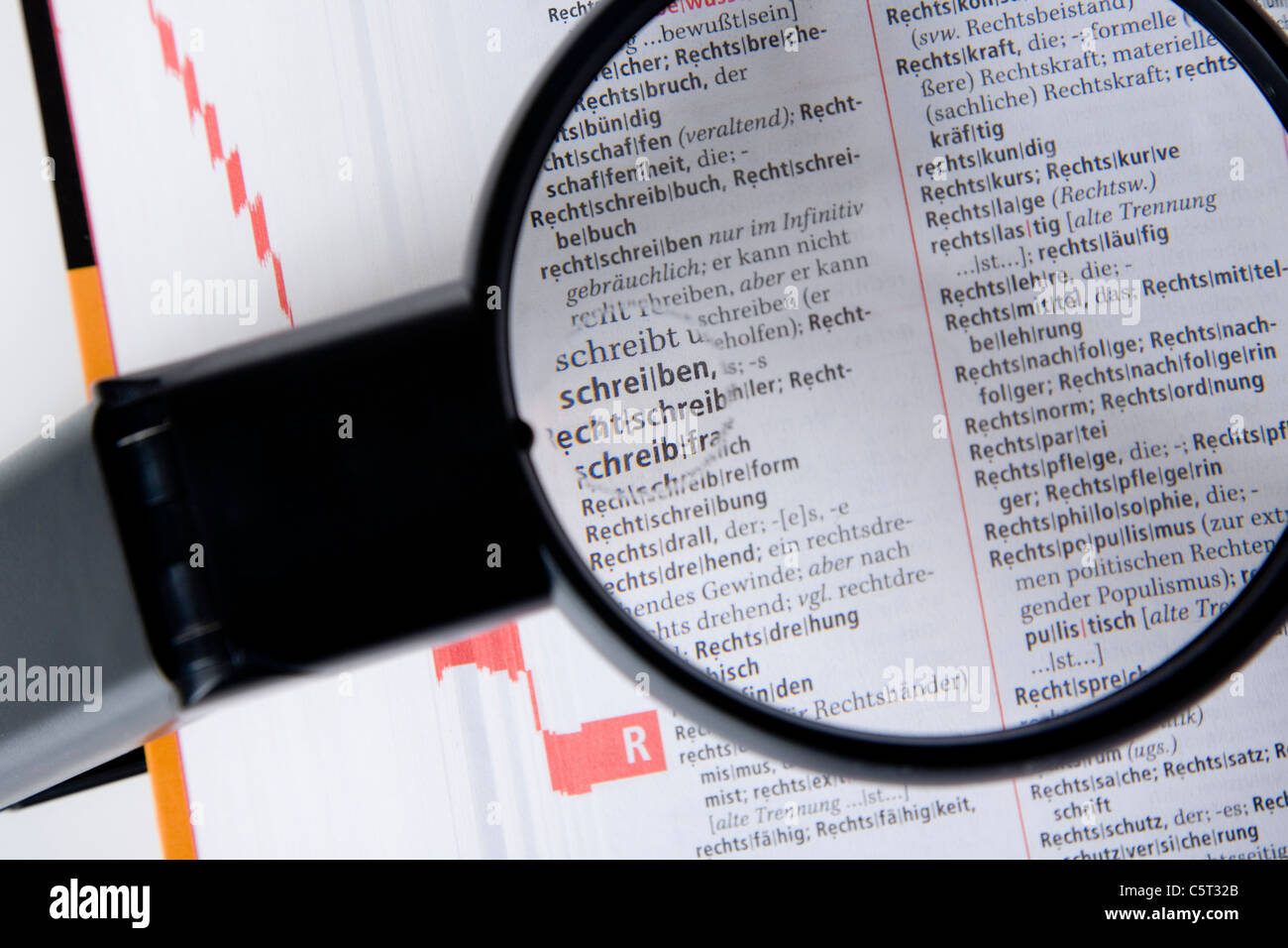 Magnifying glass dictionary close up hi-res stock photography and ...