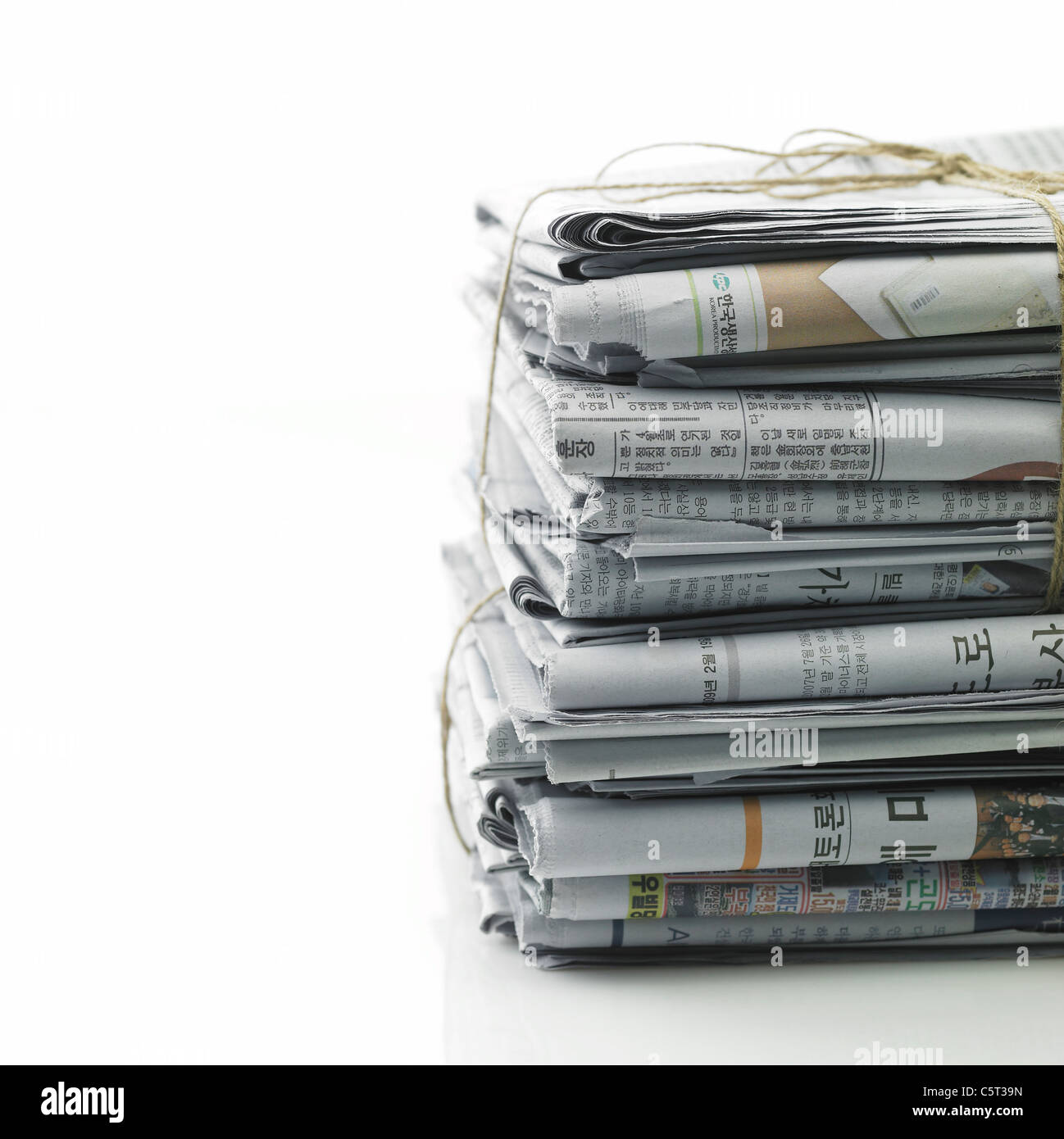 Stack of newspapers Stock Photo - Alamy