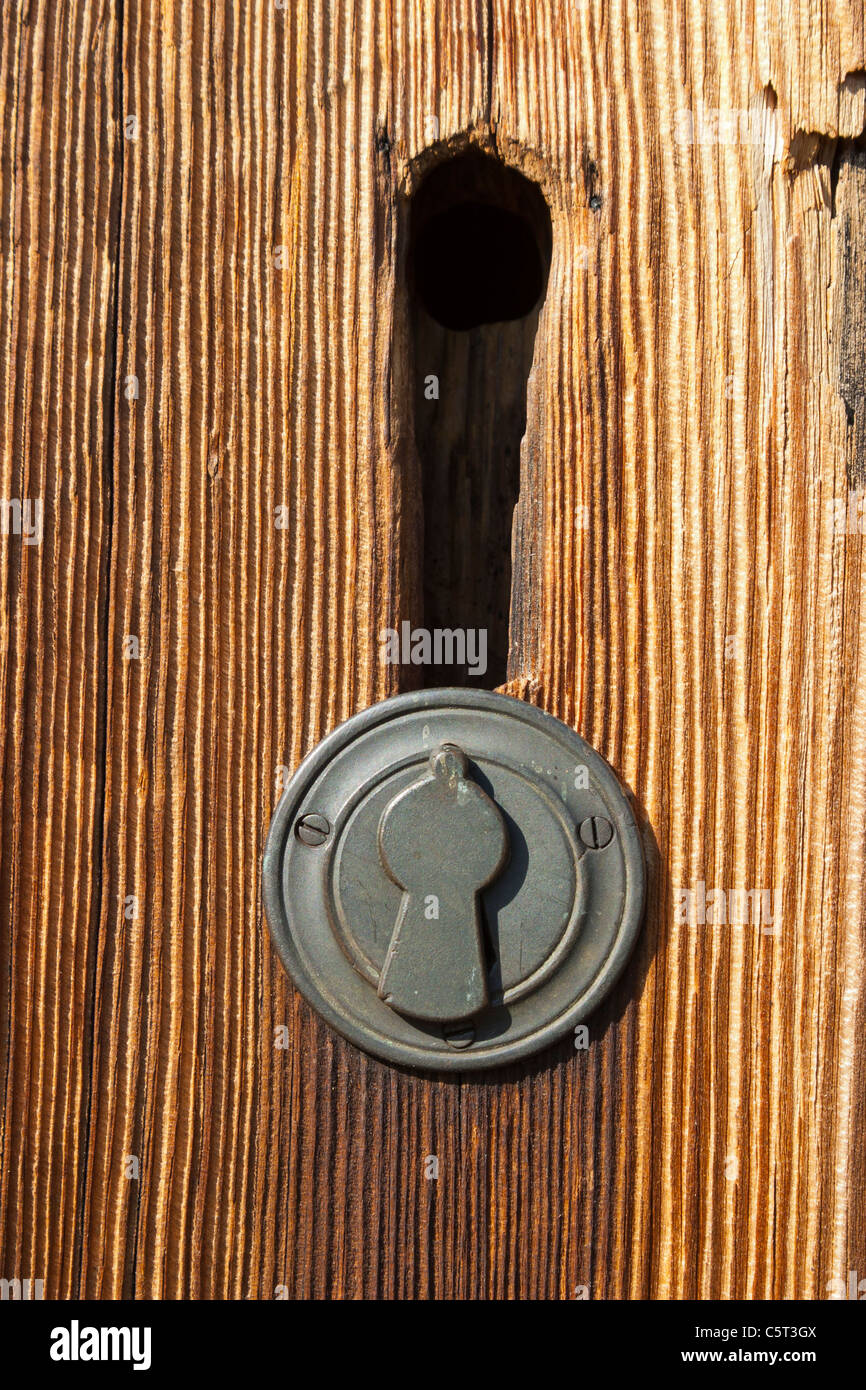 Keyhole on an old wooden door Stock Photo - Alamy
