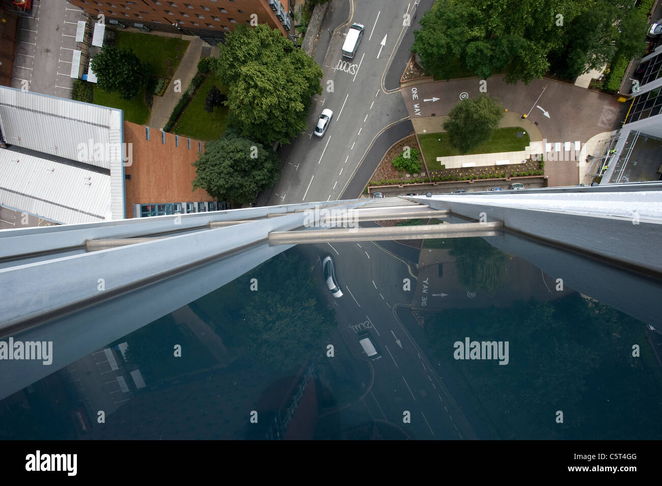 Vertigo-inducing view from top of tall building Stock Photo - Alamy