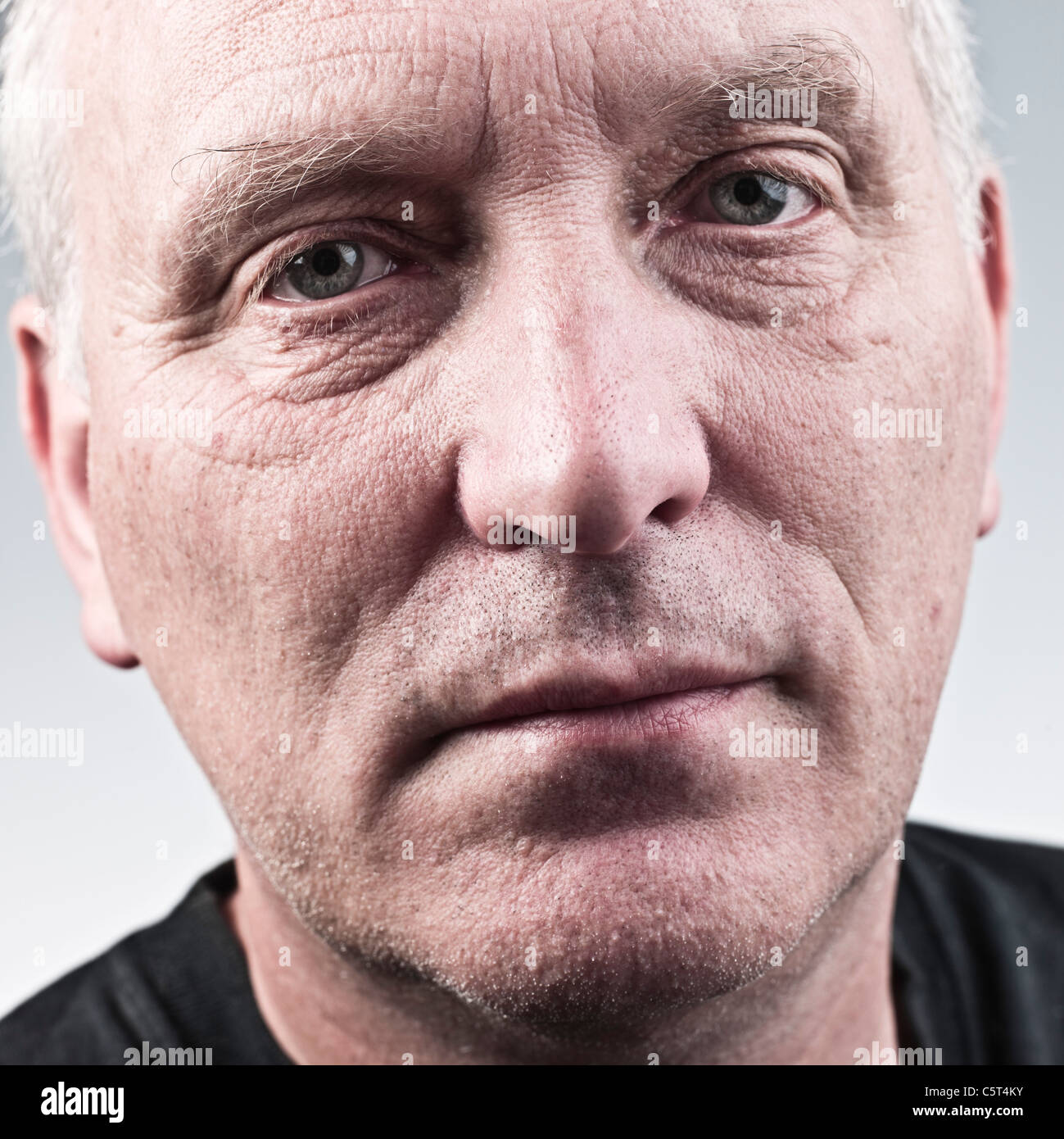 Hard processing - version of a close up male portrait exaggerated ...