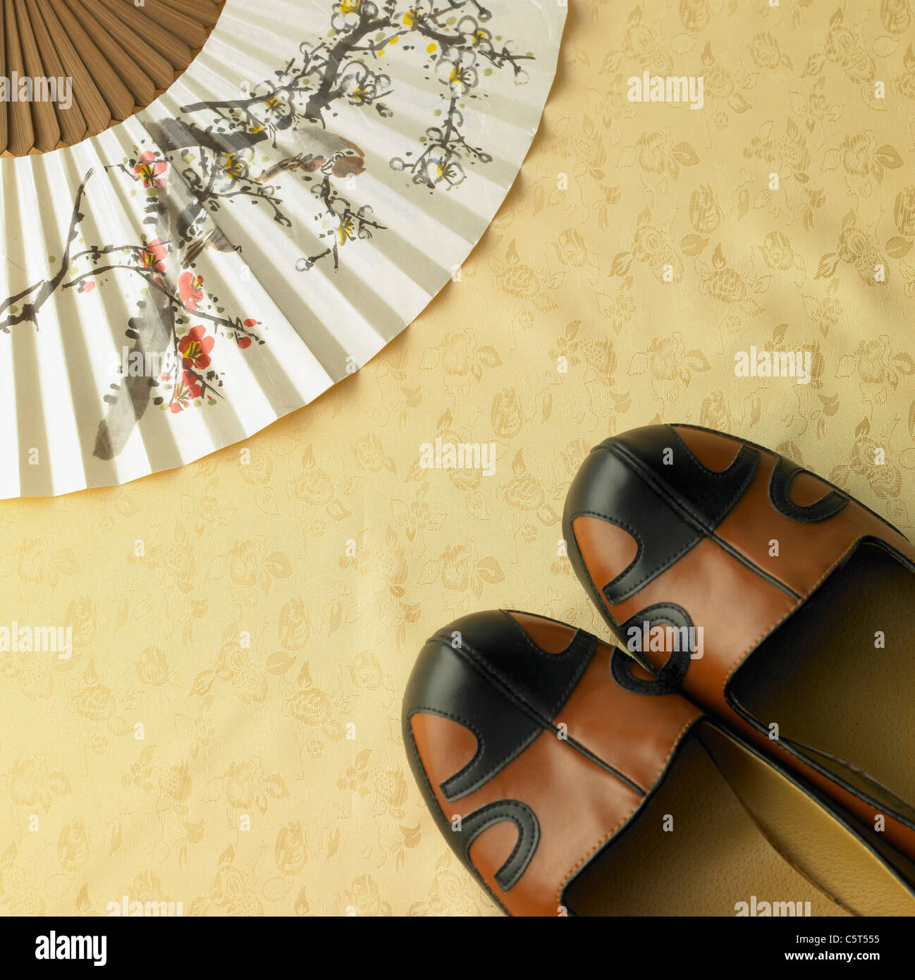 Korean traditional folding fan and shoes Stock Photo - Alamy