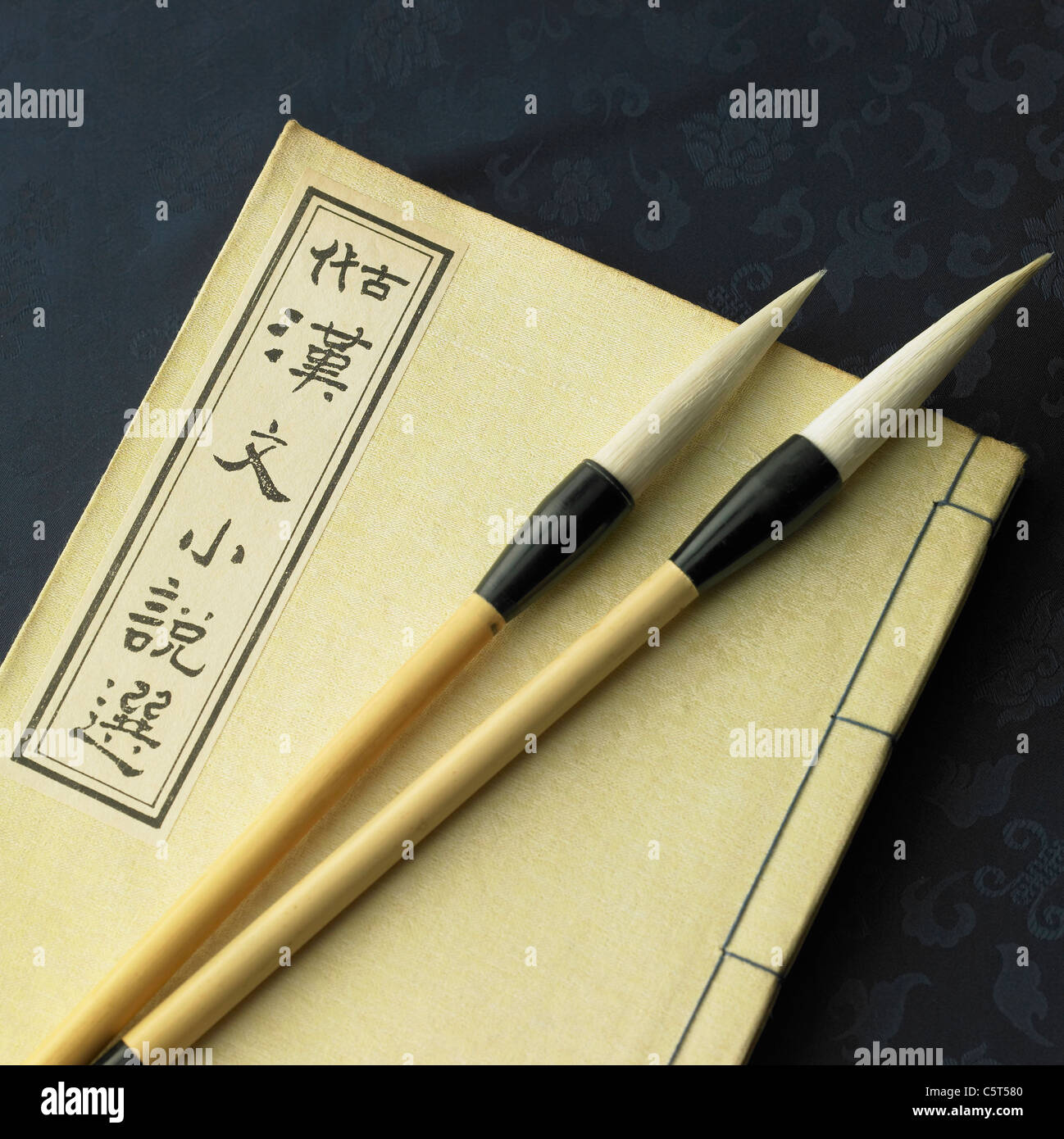 Korean antique book and calligraphy brushes Stock Photo - Alamy