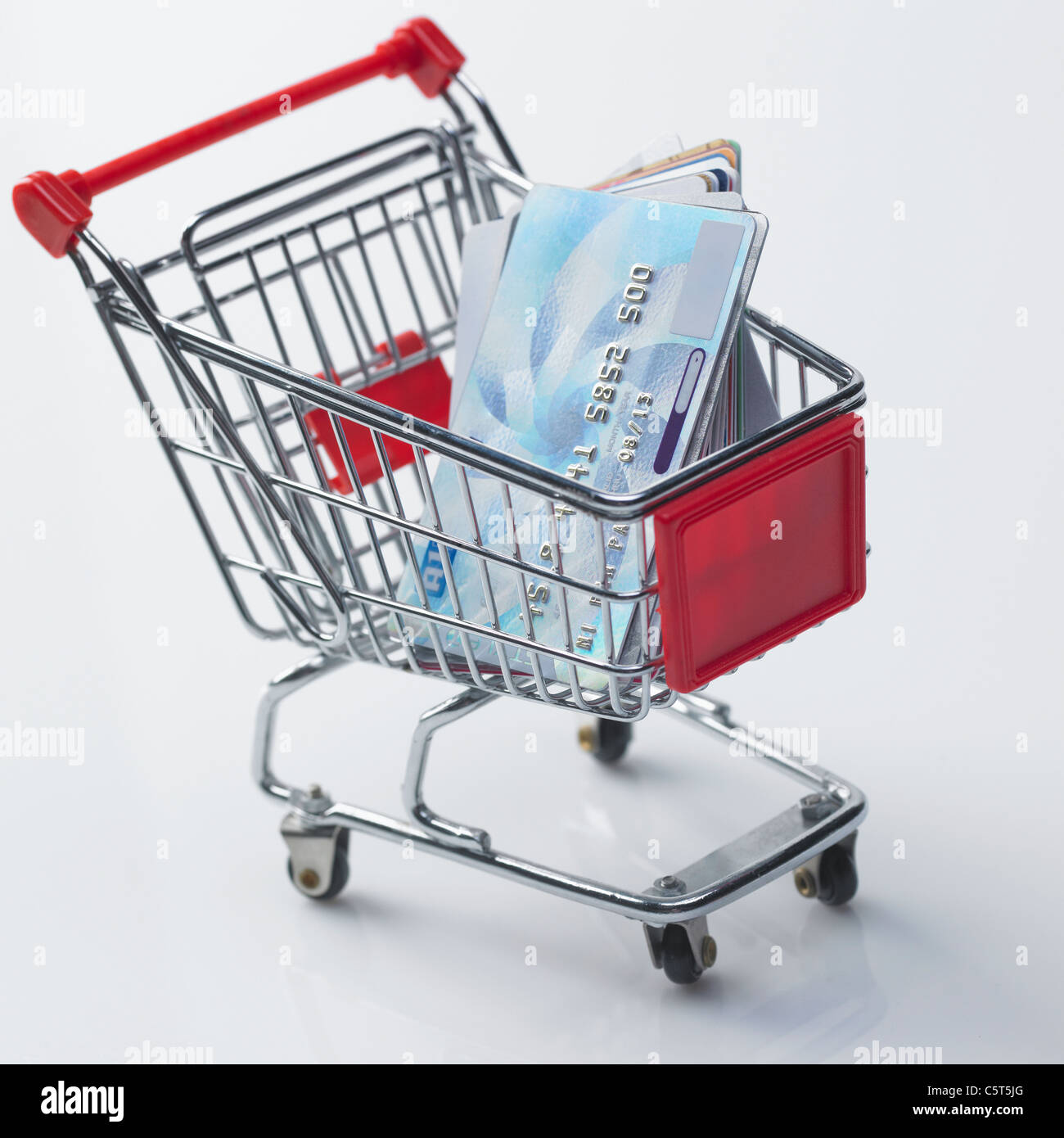 Credit cards in a shopping cart Stock Photo - Alamy