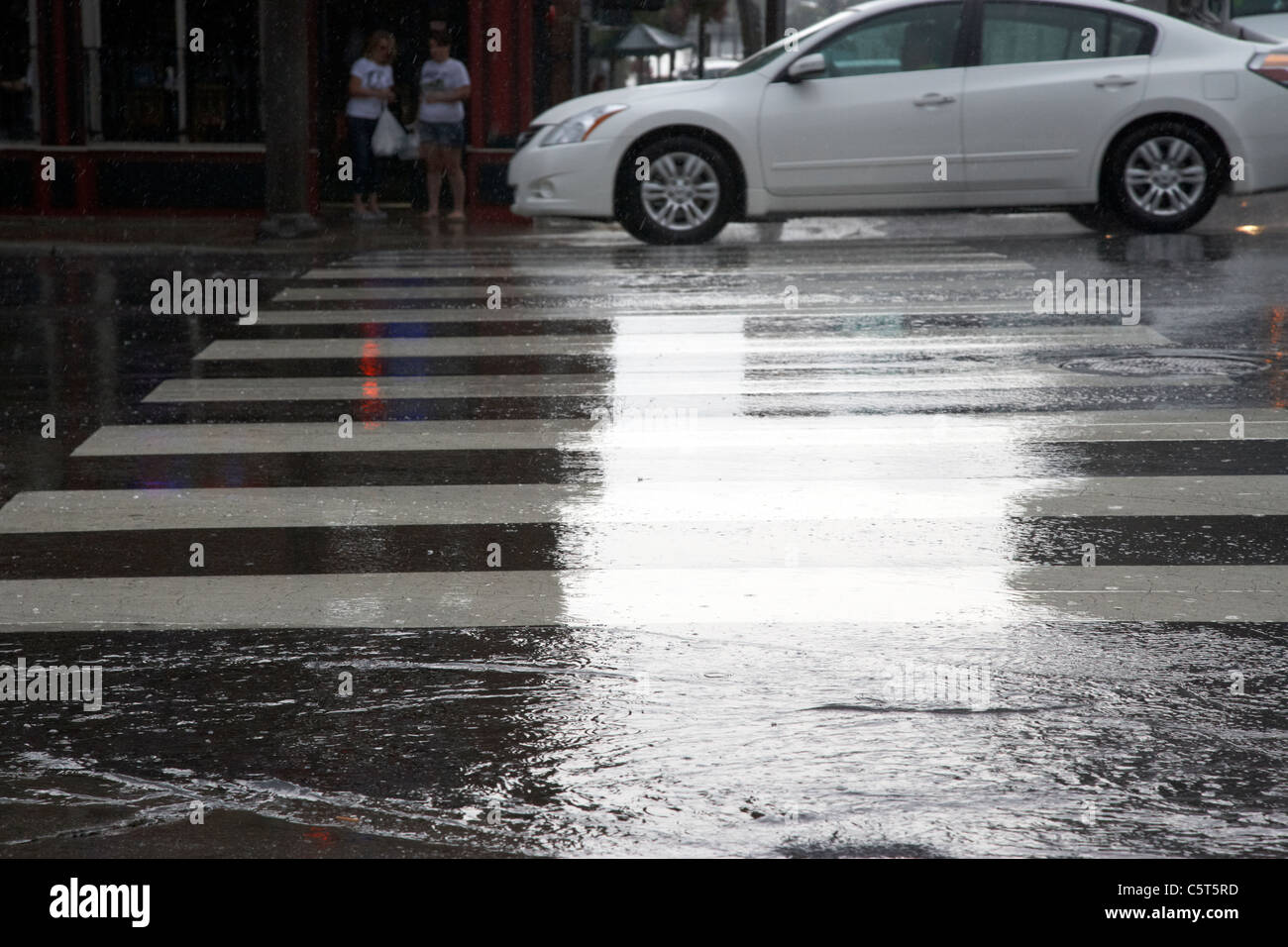 traffic and crosswalk in heavy rain downtown broadway Nashville ...