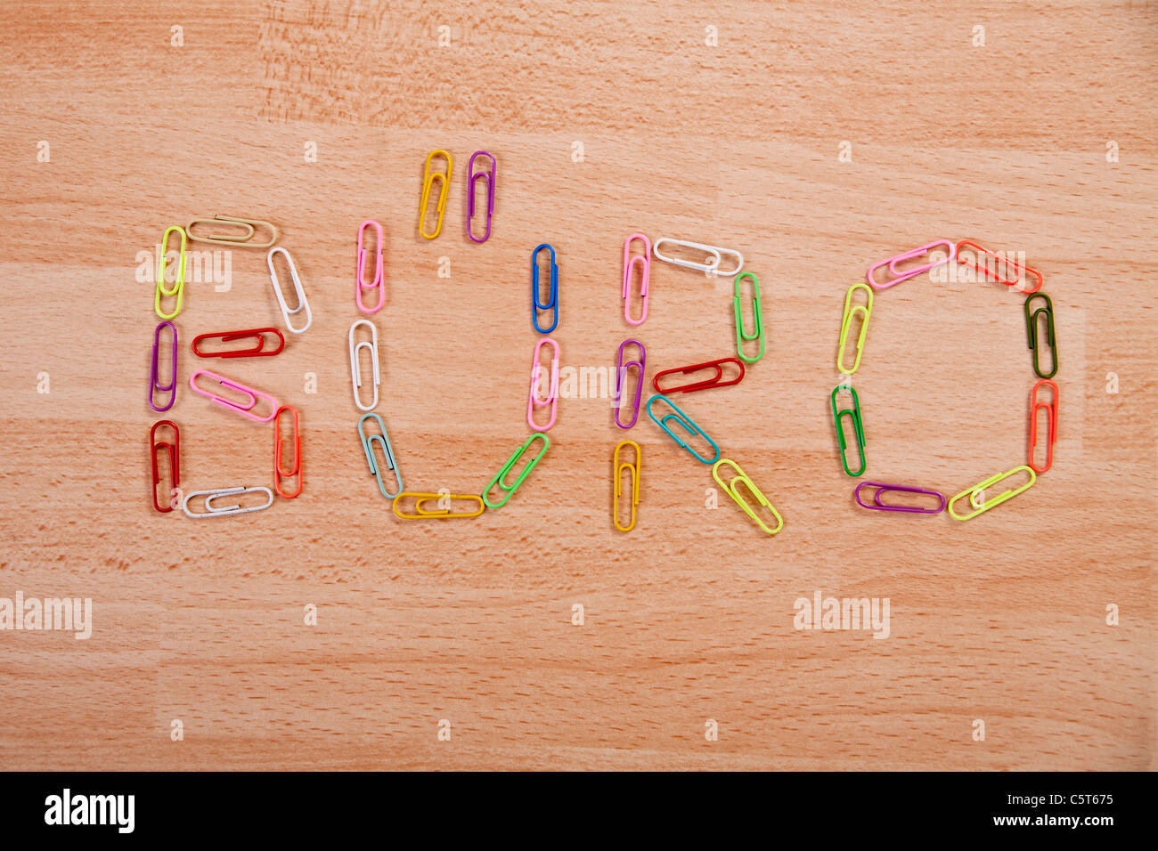 Close up of text written with paper clips on wooden background Stock ...