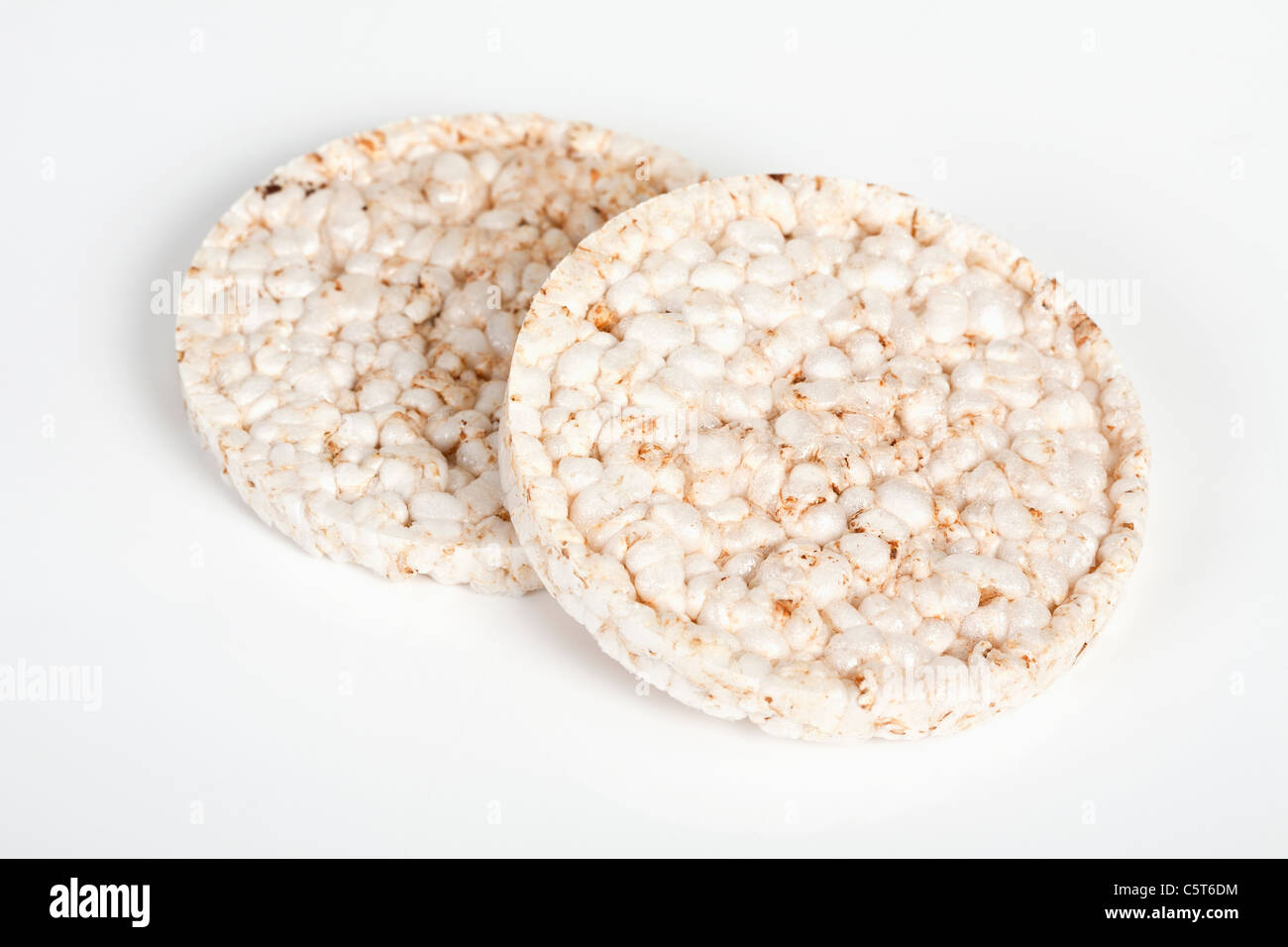 Close up of puffed rice waffer on white background Stock Photo - Alamy