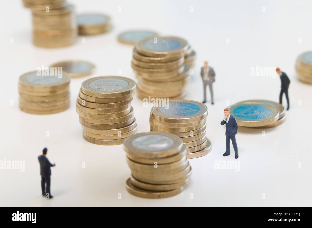 Money stack figurines hi-res stock photography and images - Alamy