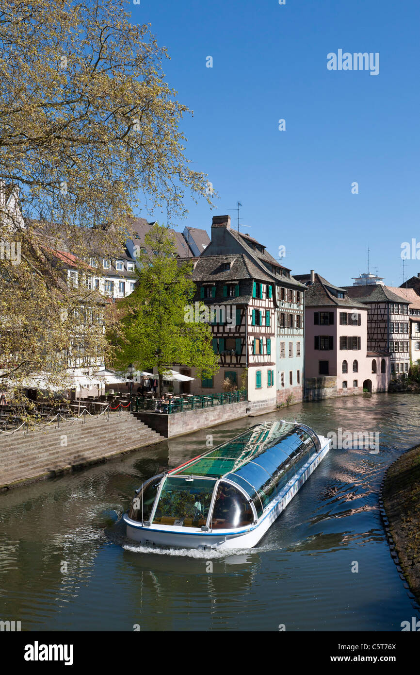 France, Alsace, Strasbourg, Petite-France, View of tourboat in L'ill ...