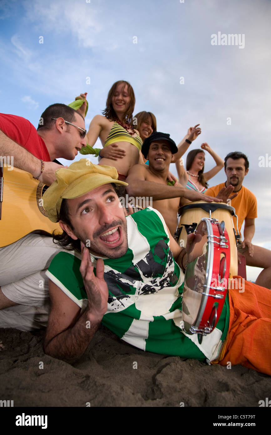 Spain, Canary, Islands, Gran Canaria, Young people celebrating on beach ...