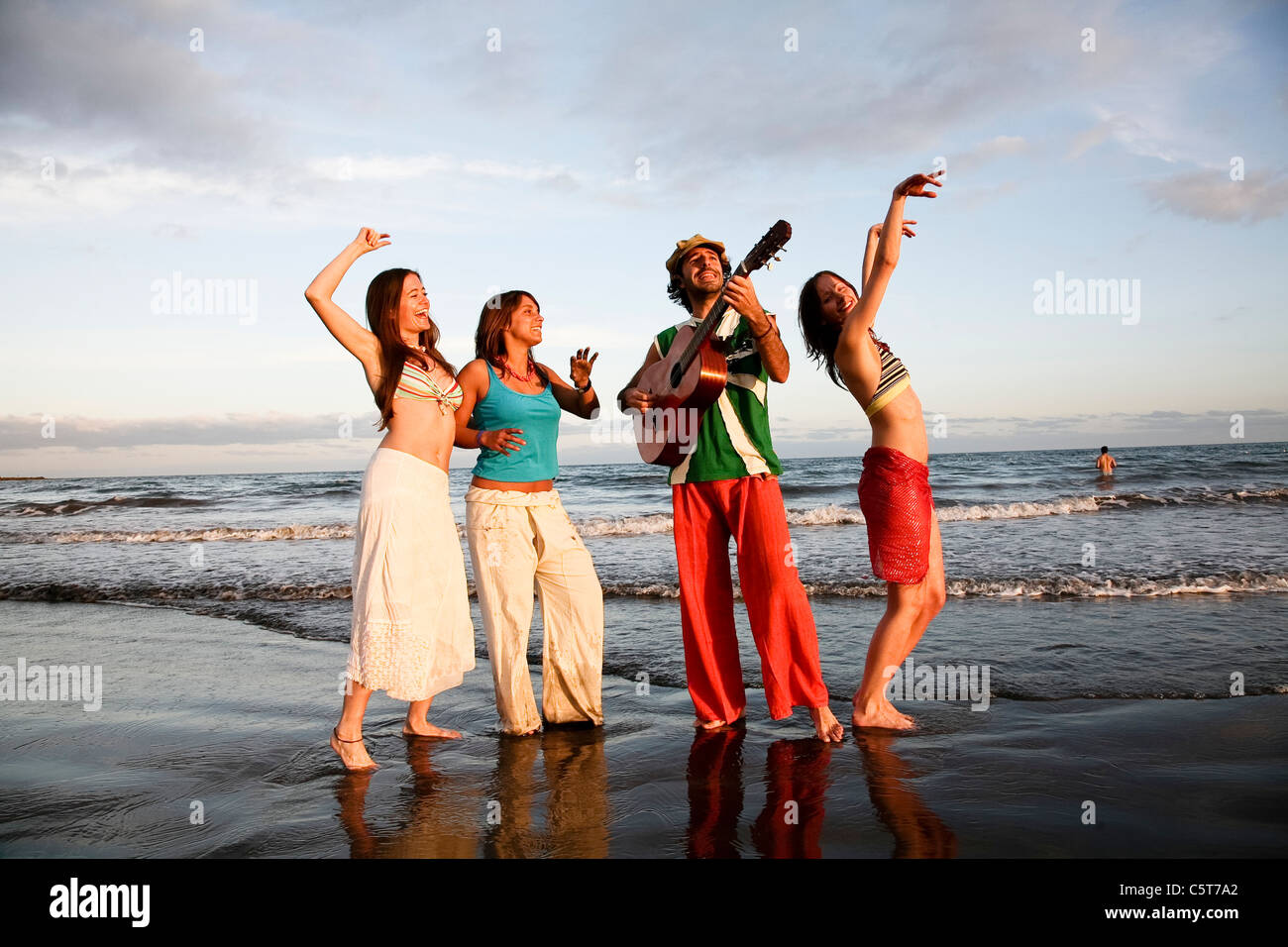 Woman dancing singing on beach hi-res stock photography and images - Alamy