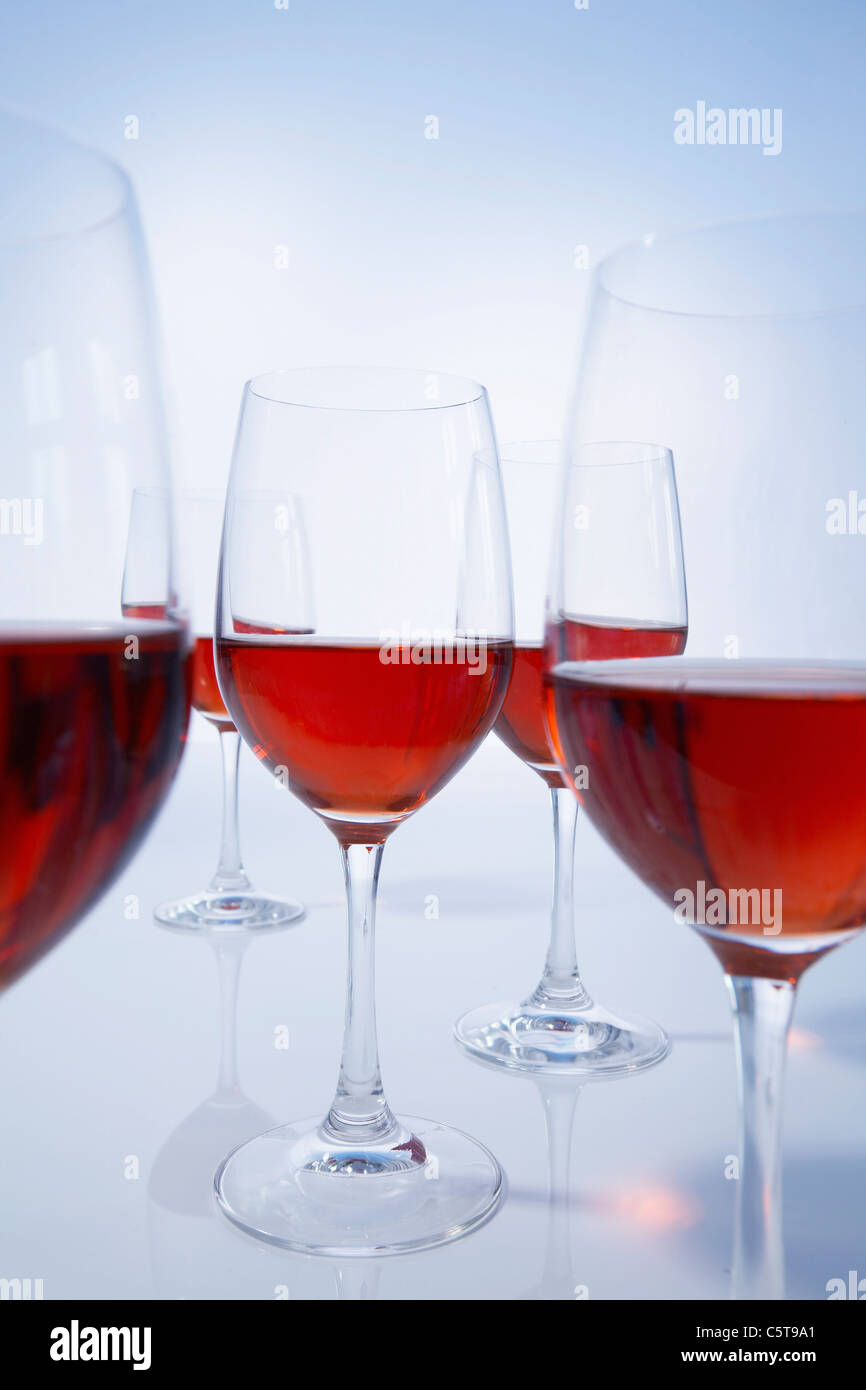 Rose wine glasses filled with rose wine Stock Photo - Alamy