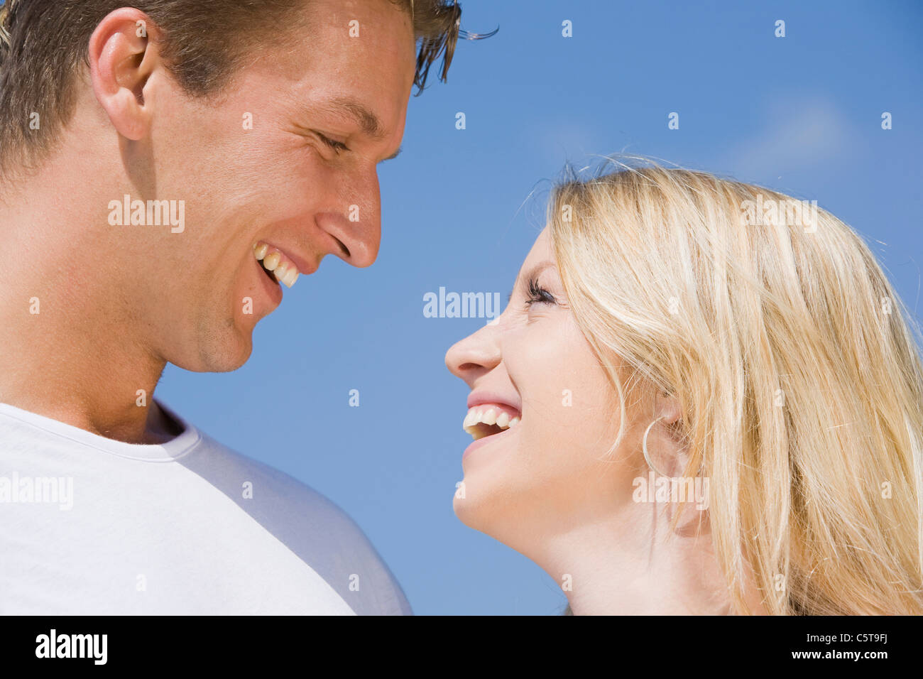 Germany, Bavaria, Munich, Couple, face to face, smiling, portrait Stock ...