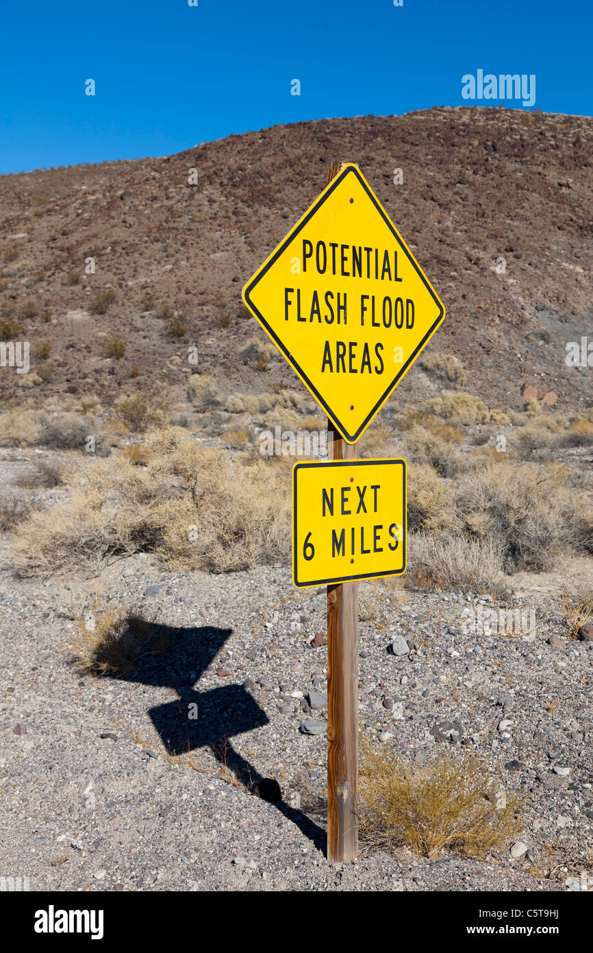Warning sign for flash floods in desert Death Valley USA Stock Photo ...