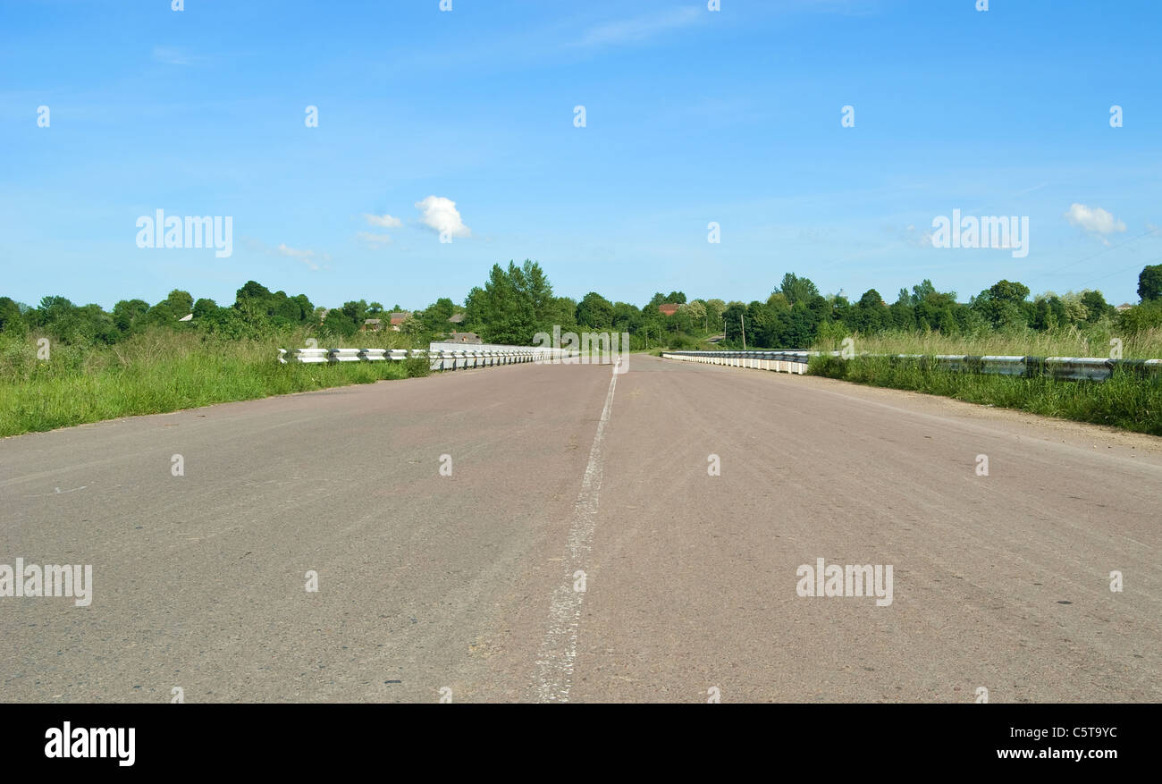 country highway on a background sky Stock Photo - Alamy