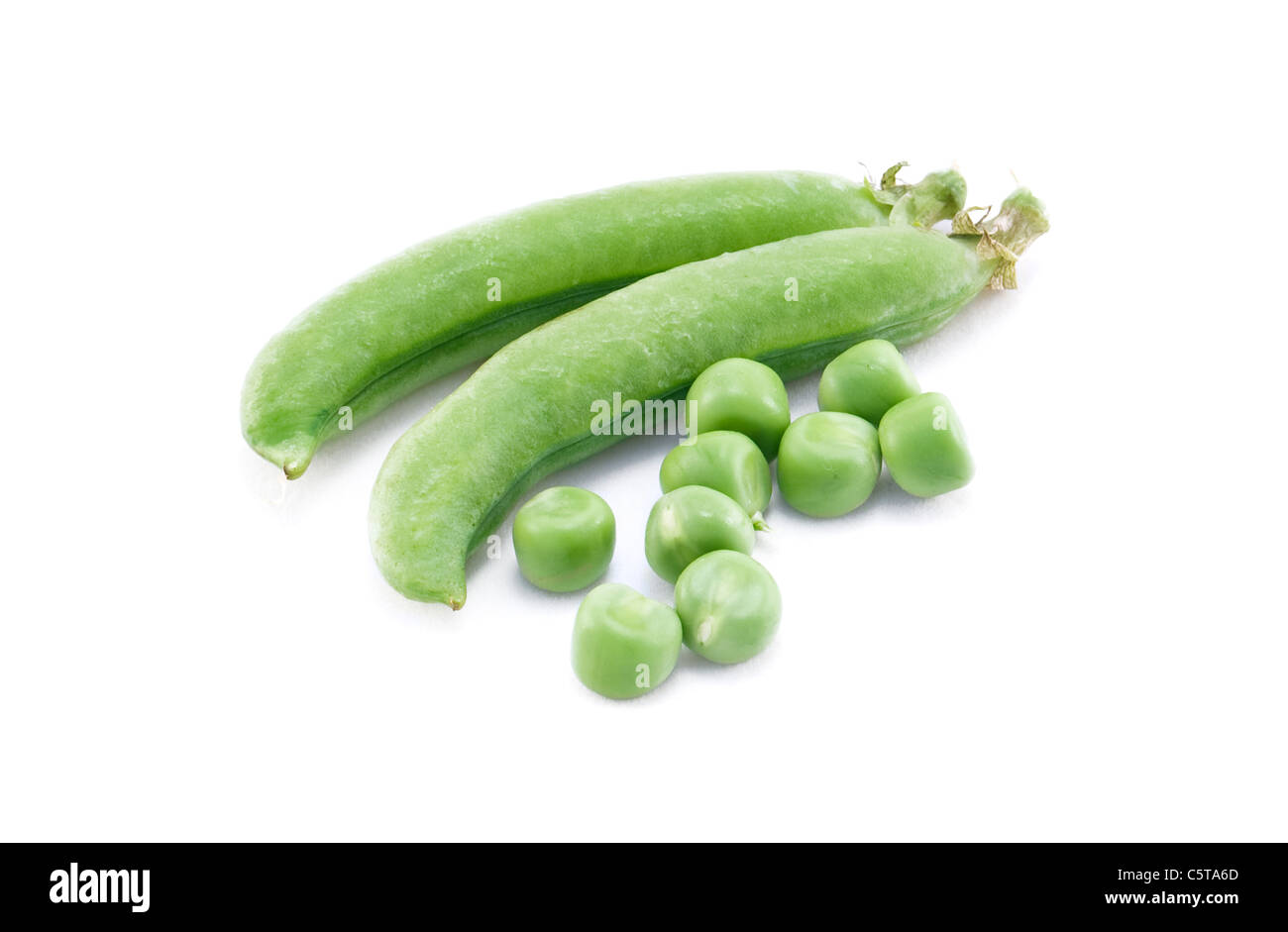 fresh green pea in the pod isolated on white background Stock Photo - Alamy
