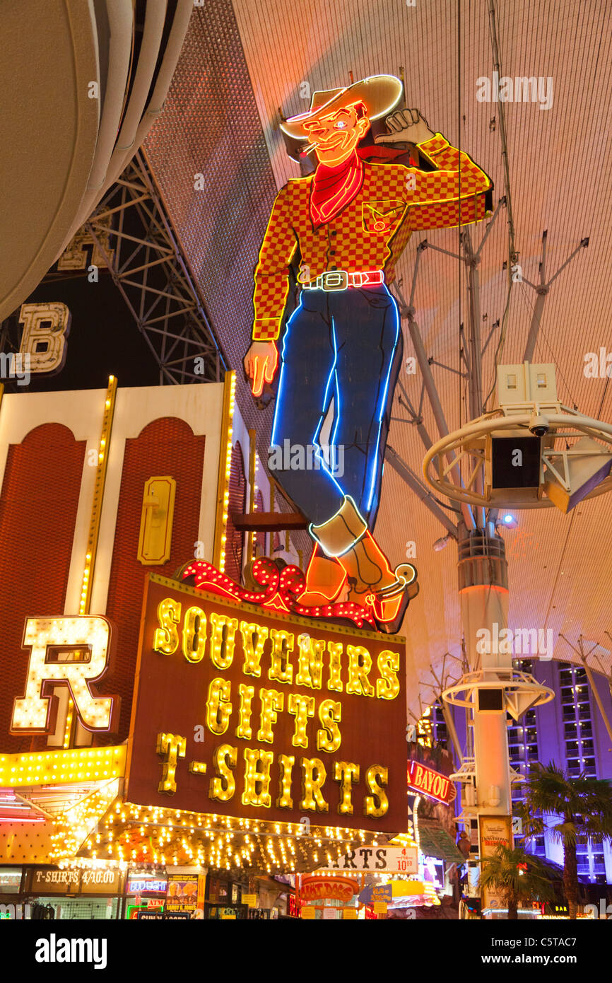 Neon sign for Souvenirs gifts and t-shirts with a cowboy Las Vegas USA ...