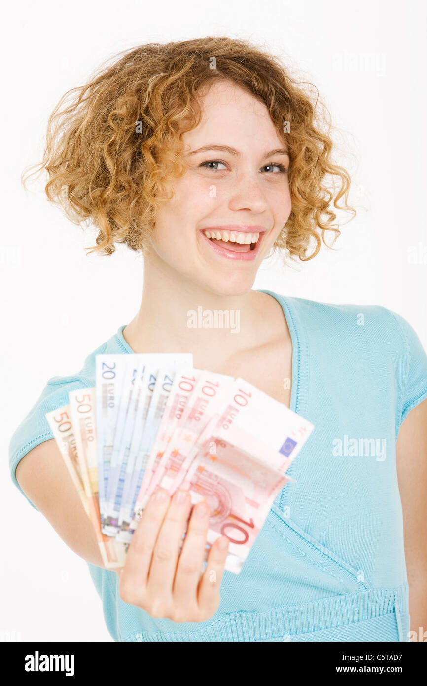 Woman holding 50 euro banknotes hi-res stock photography and images - Alamy