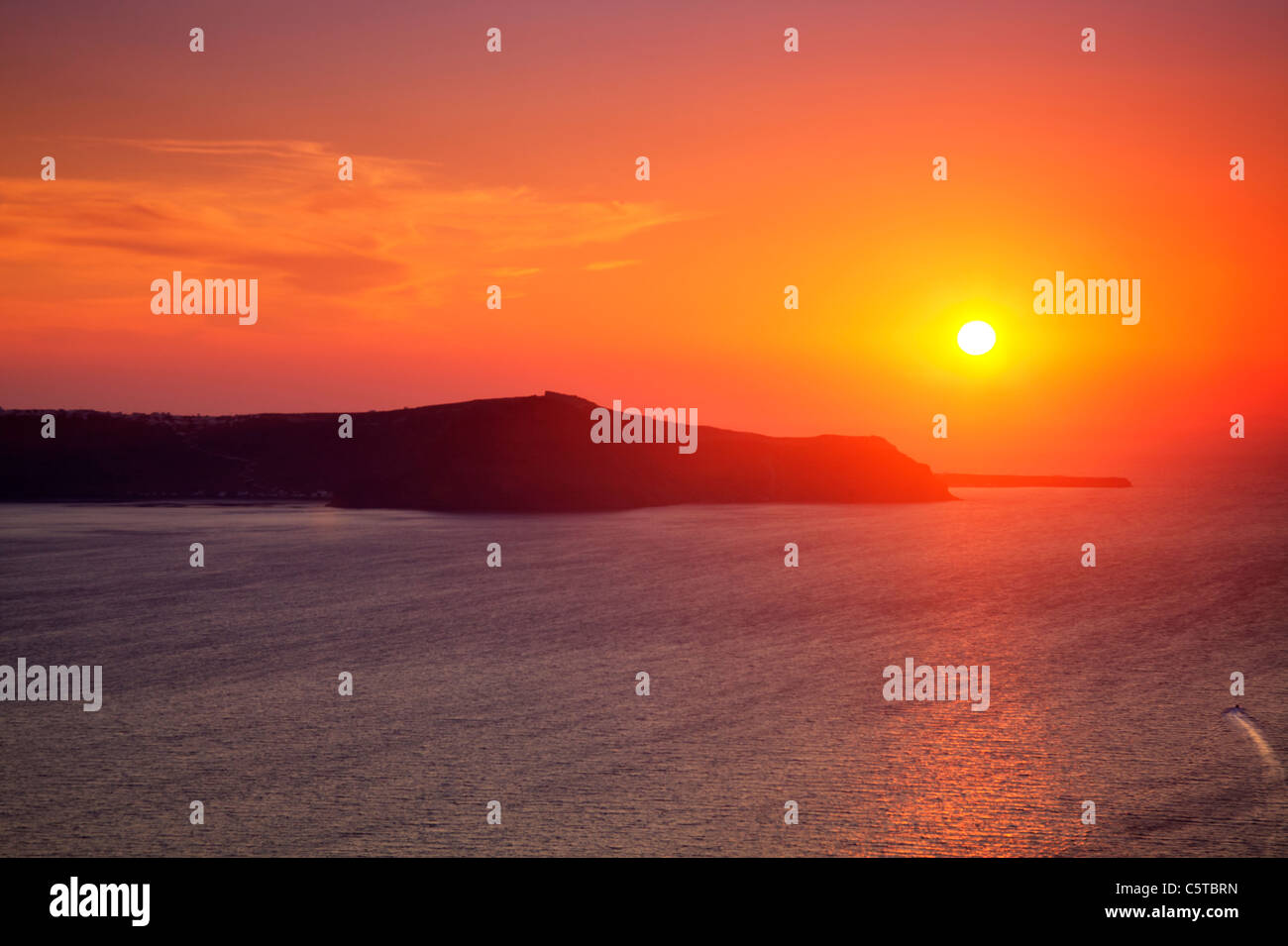 Santorini, Greek Island, Cyclades, Greece, red glow from iconic sunset ...
