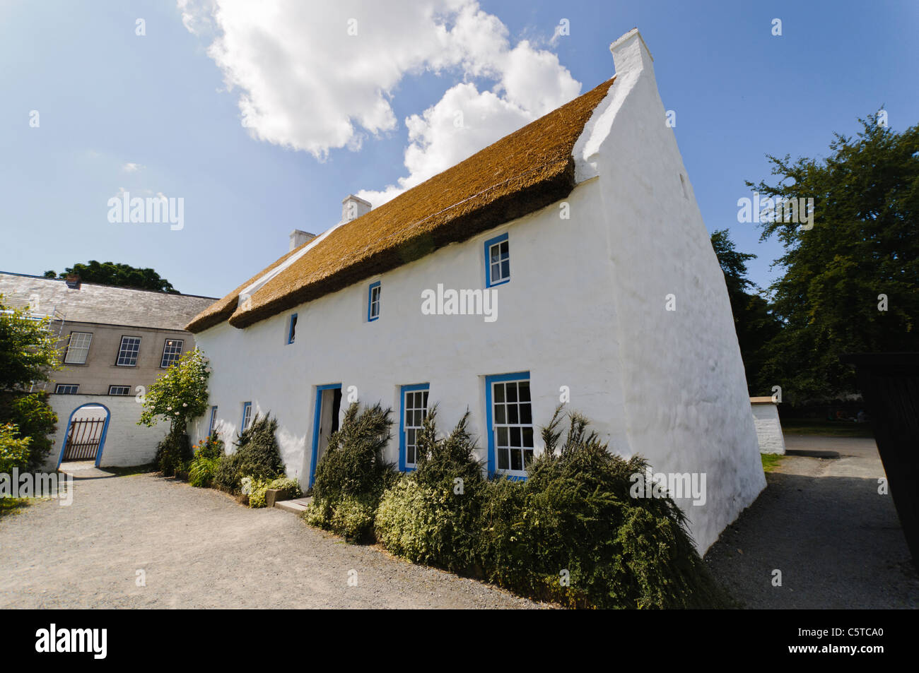 Old fashioned Irish thatched town-house at the Ulster Folk Park Museum ...