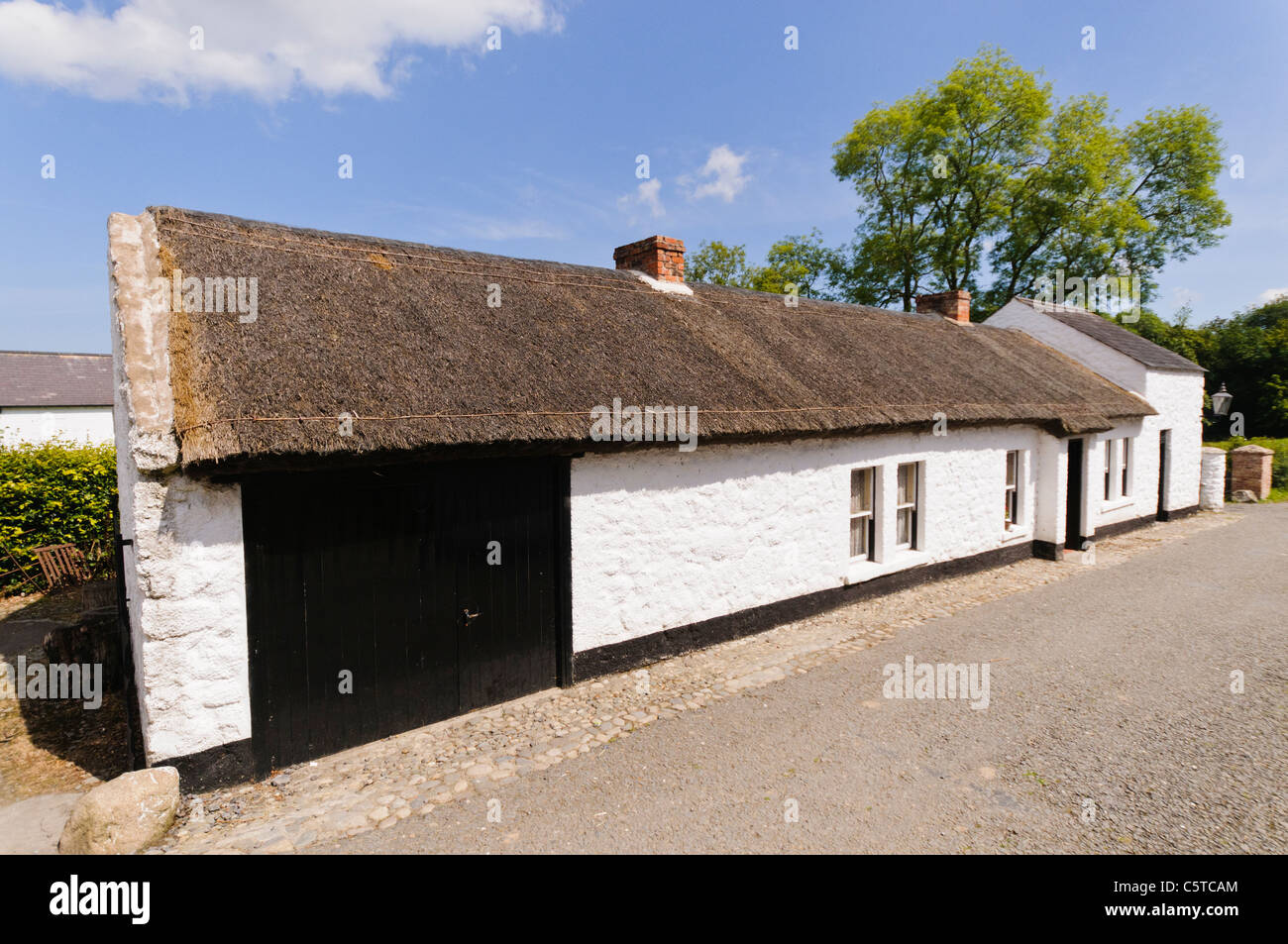 Traditional Irish thatched farmhouse cottage at the Ulster Folk Park ...