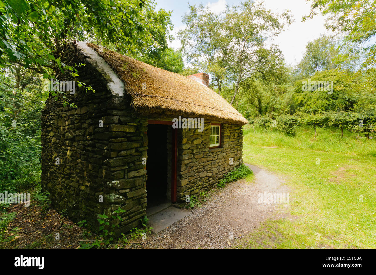 Traditional Irish thatched farmhouse cottage at the Ulster Folk Park ...