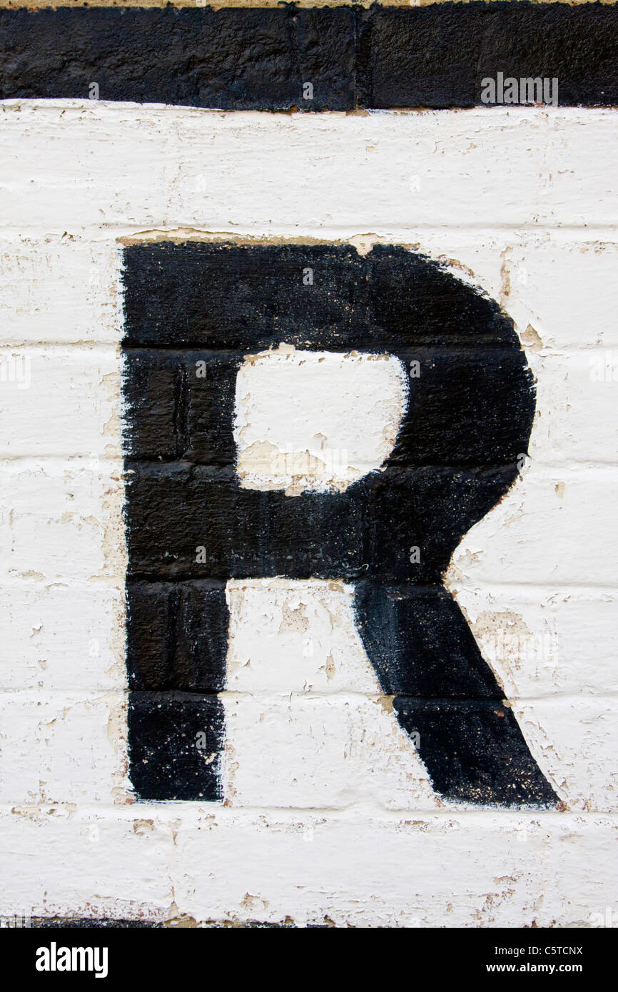 Character R alphabet character letter outside sign Stock Photo - Alamy
