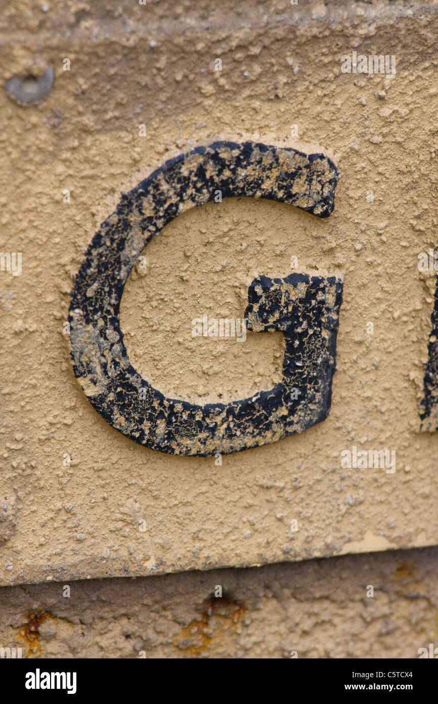 Character G alphabet character letter outside sign Stock Photo - Alamy