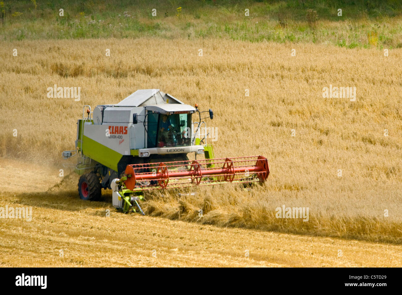 Claas Lexion 430 combine harvester working in wheat field Stock Photo ...