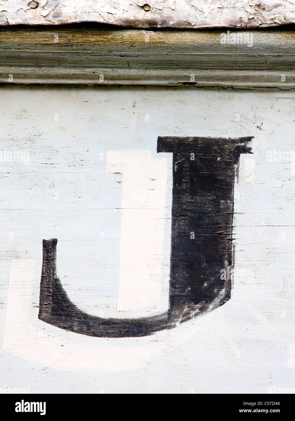 Character J alphabet character letter outside sign Stock Photo - Alamy
