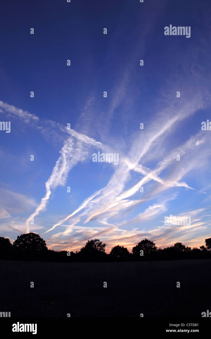 Contrails and dramatic sky. Tolworth Court Farm Nature Reserve, Surrey ...