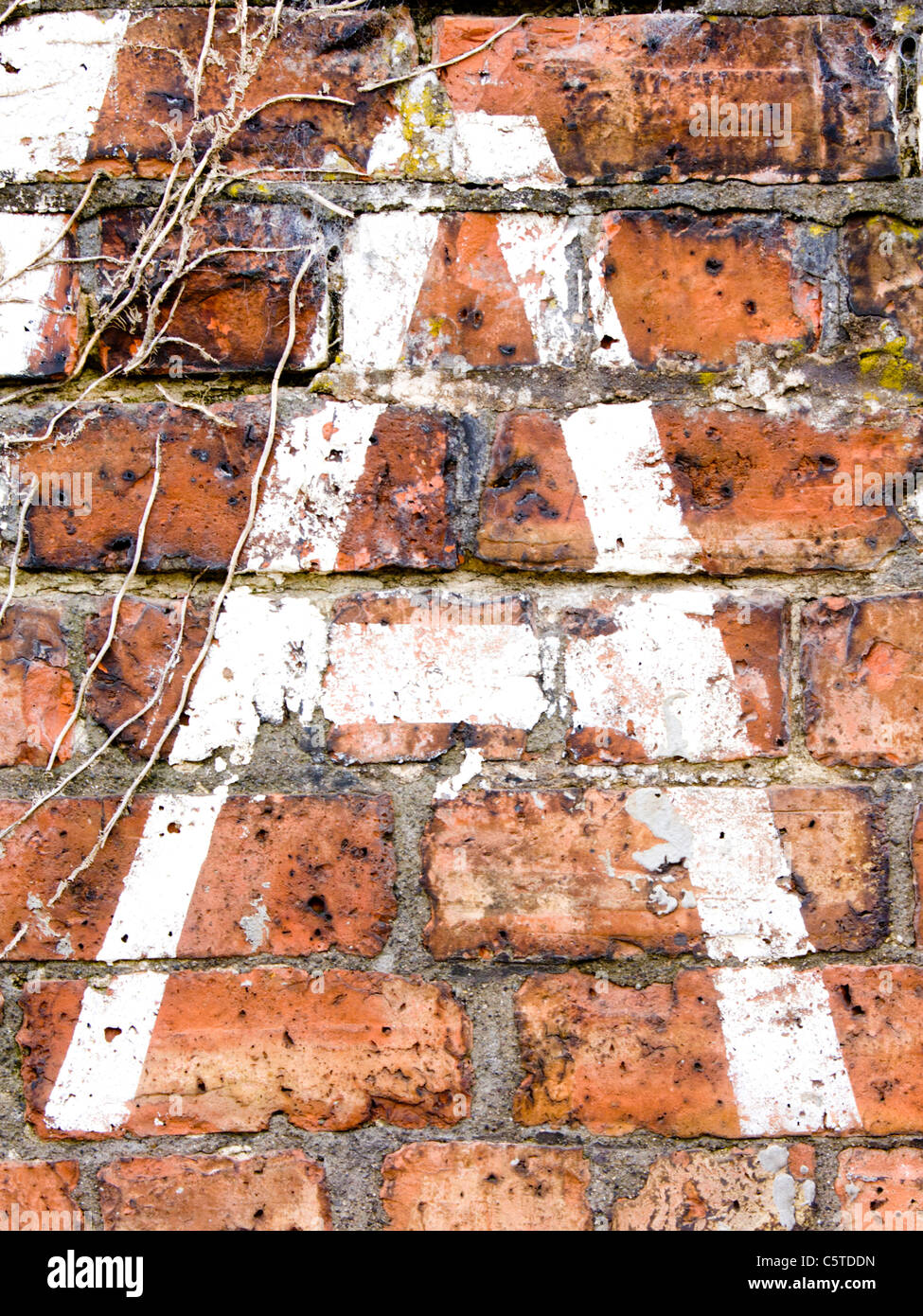 A Character character letter photograph brick wall Stock Photo - Alamy