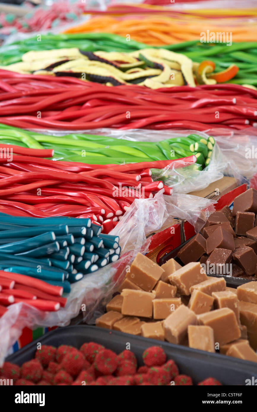 close up of sticks of coloured liquorice and fudge on sweet stall Stock ...