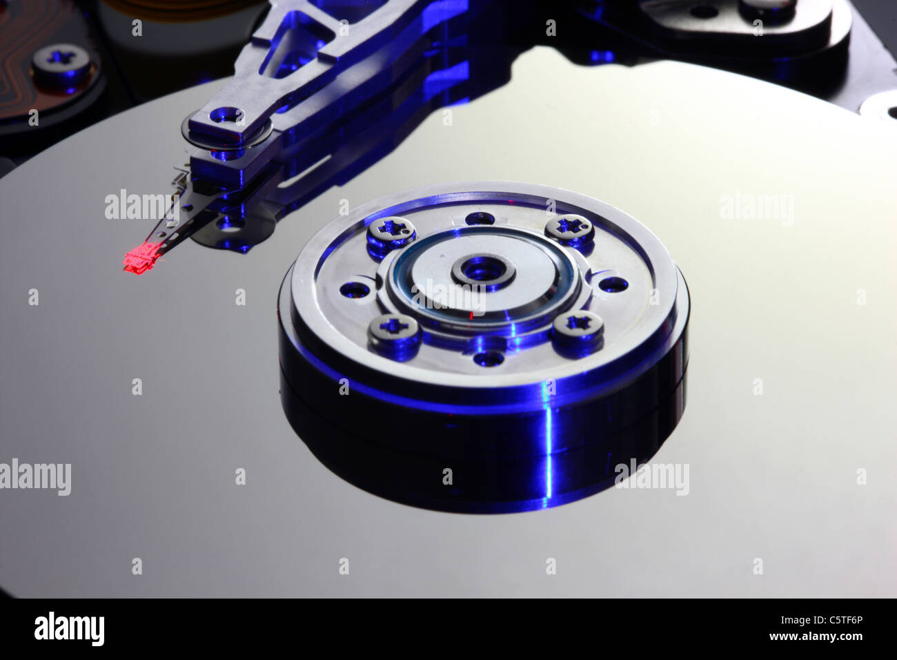 Computer hard drive, opened, reading/writing head and hard disk Stock Photo - Alamy
