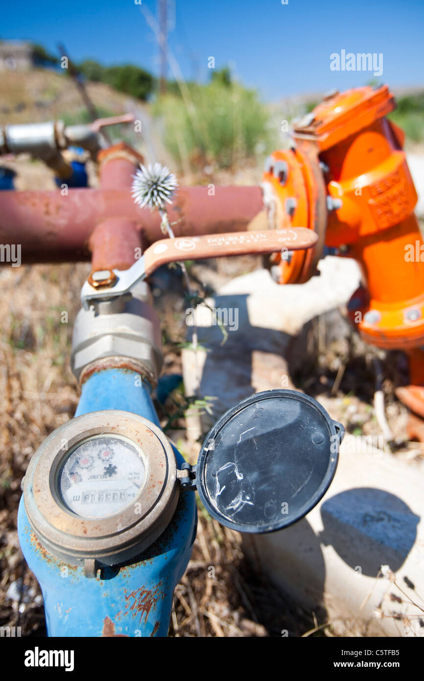 Irrigation water pipes supplying water to surrounding farmland near ...
