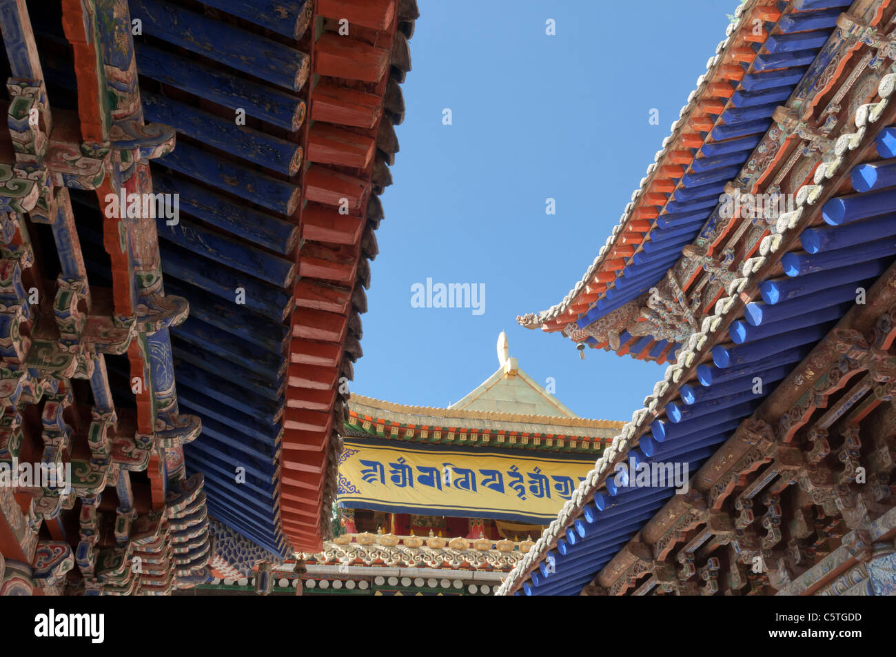 Ornate roof lines of Tibetan Buddhist temple, Kumbum Monastery ...