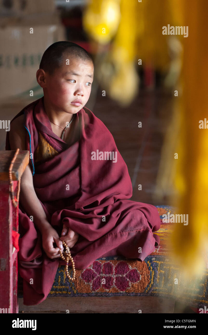 Young boy Tibetan Buddhist monk at Dulan Monastery, Ulan, Qinghai ...