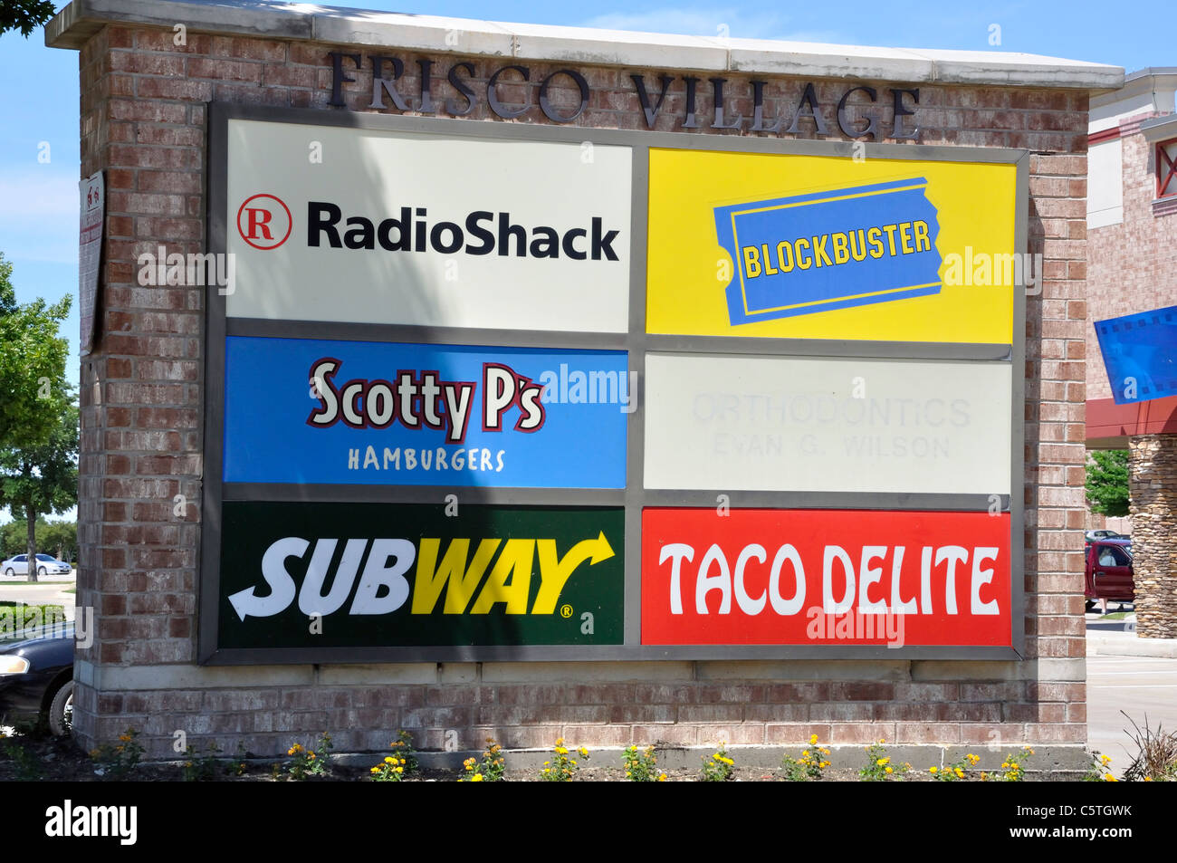 Retailers and businesses signs list Stock Photo - Alamy