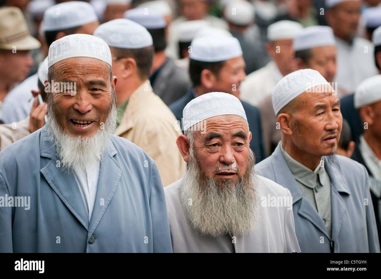 Senior Ethnic Muslim men leave Friday prayers at the Great Mosque ...