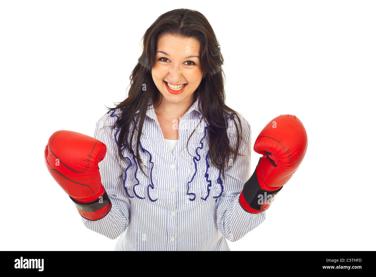 Yes!Winner business woman cheering and wearing boxing gloves against ...